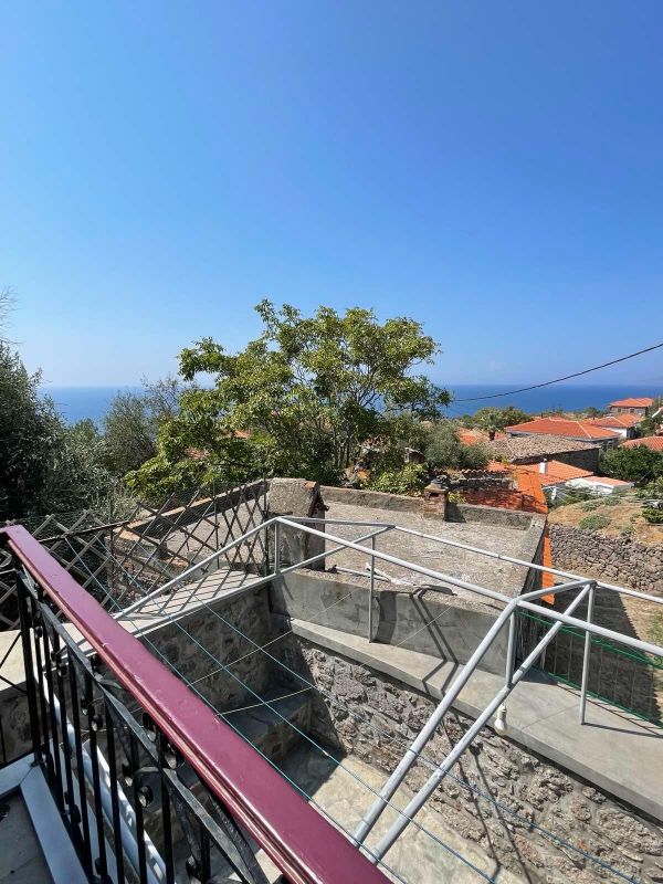 Stone-built house in traditional neibourhood of mythimna's castle in ...